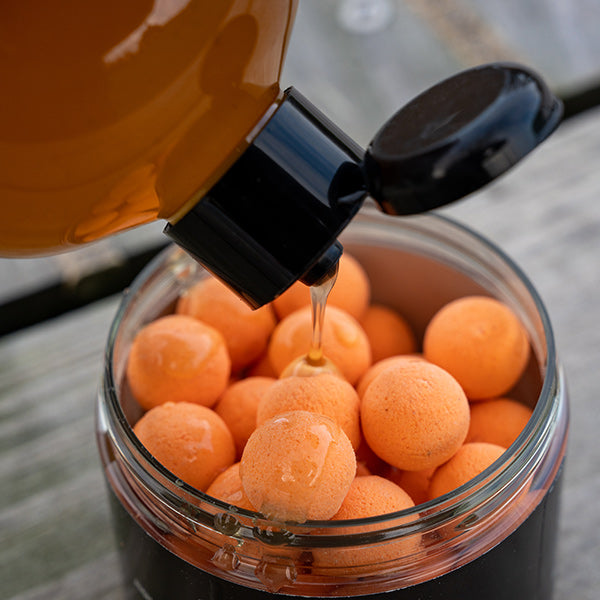 KWO Booster | Liquid vol met attractors voor boilies of pop-ups – KWO Shop